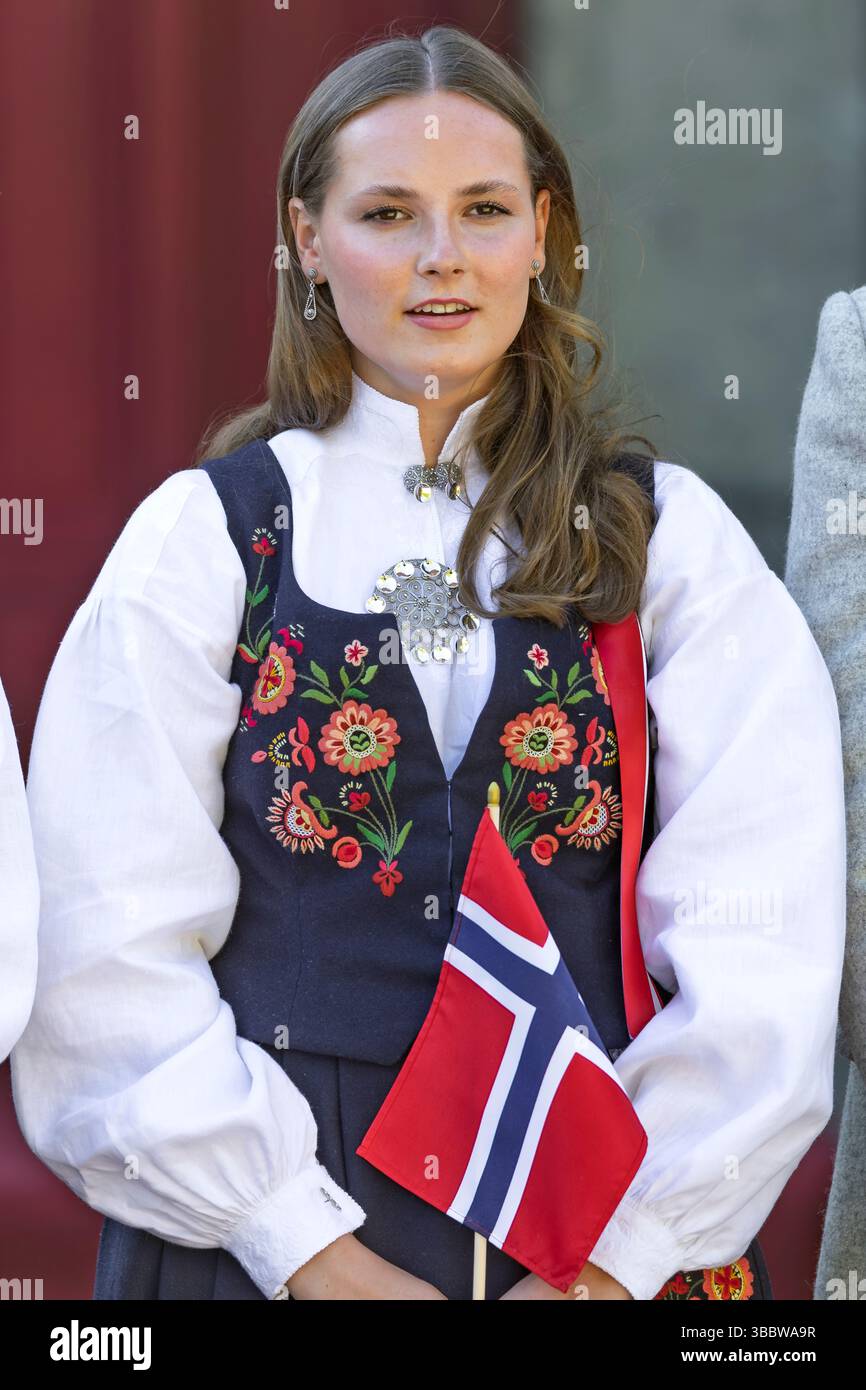Asker, Norway 17 May 2025 Crown Princess Ingrid Alexandra greets the children parada outside ...