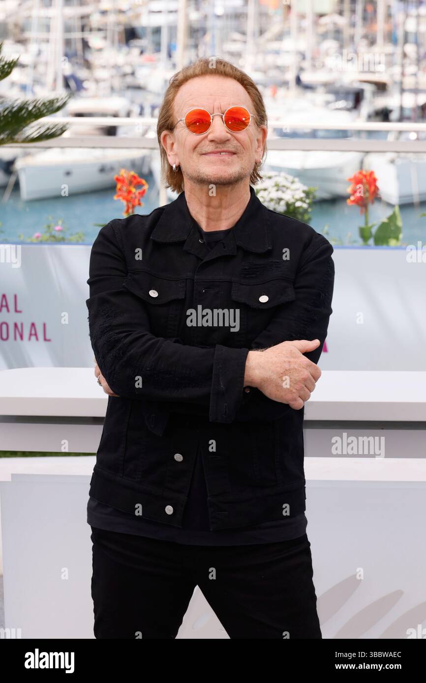 Bono poses for photographers at the photo call for the film 'Bono ...