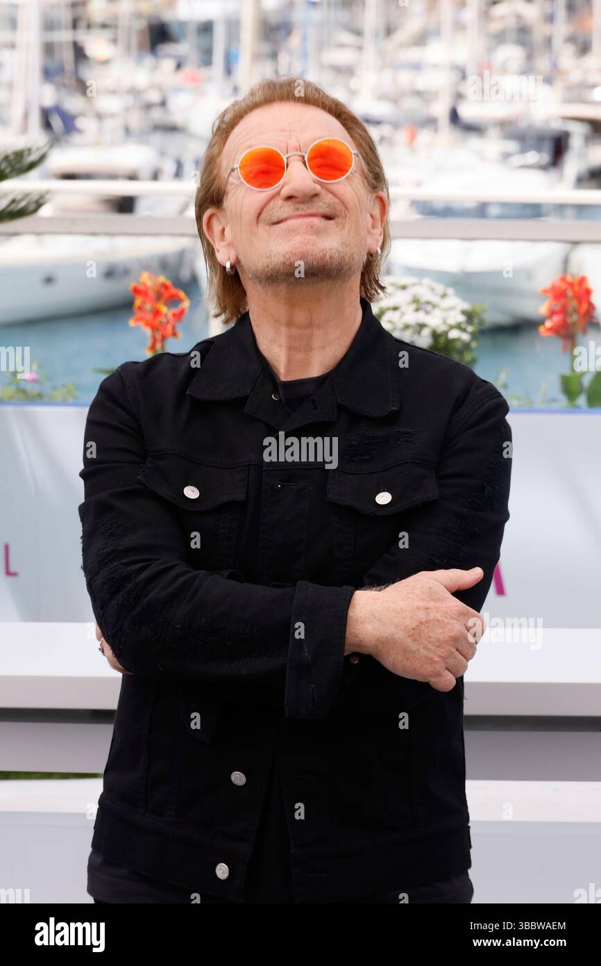 Bono poses for photographers at the photo call for the film 'Bono ...