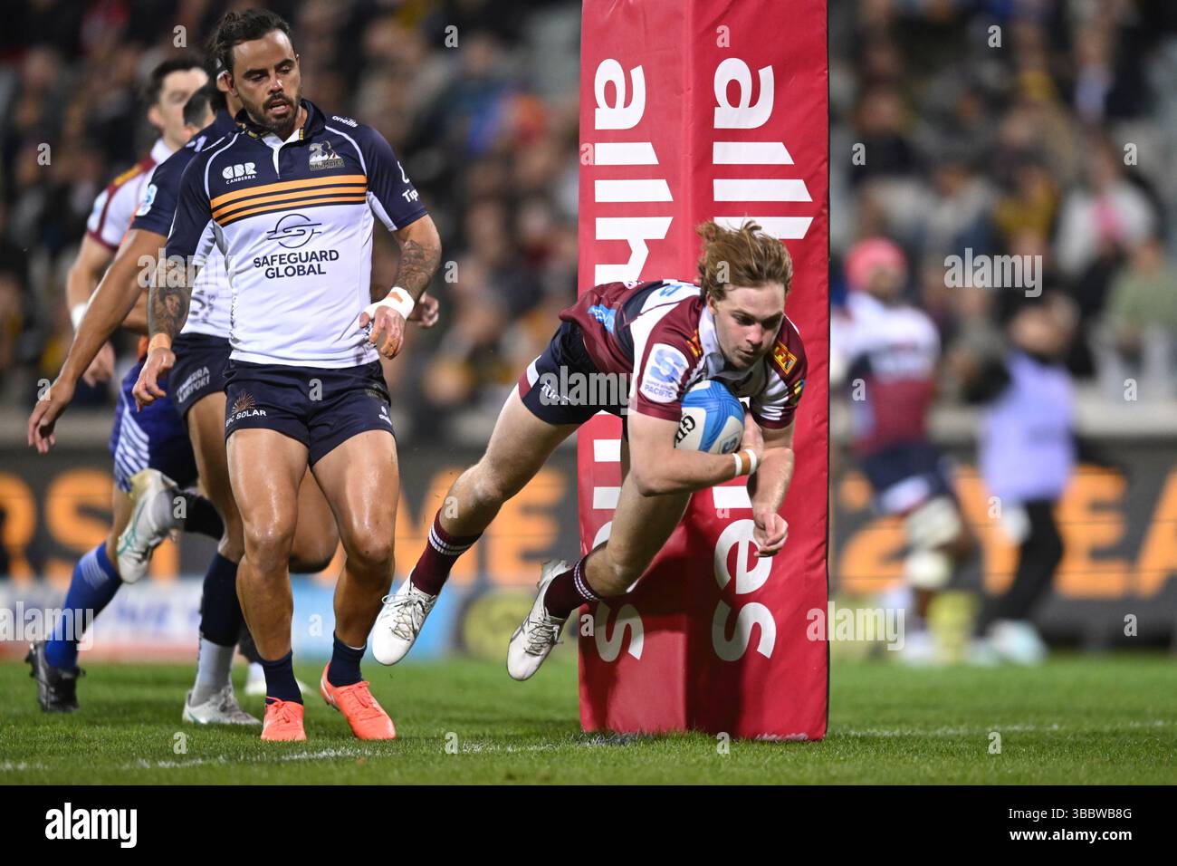 Tim Ryan of the Reds scores a try during the Super Rugby Pacific Round ...