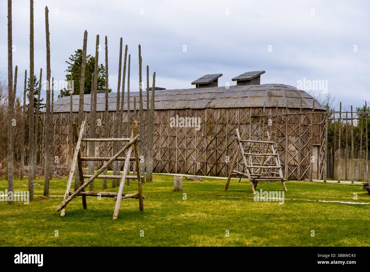 A long house in a reconstructed 15th century Iroquoian village. Milton ...