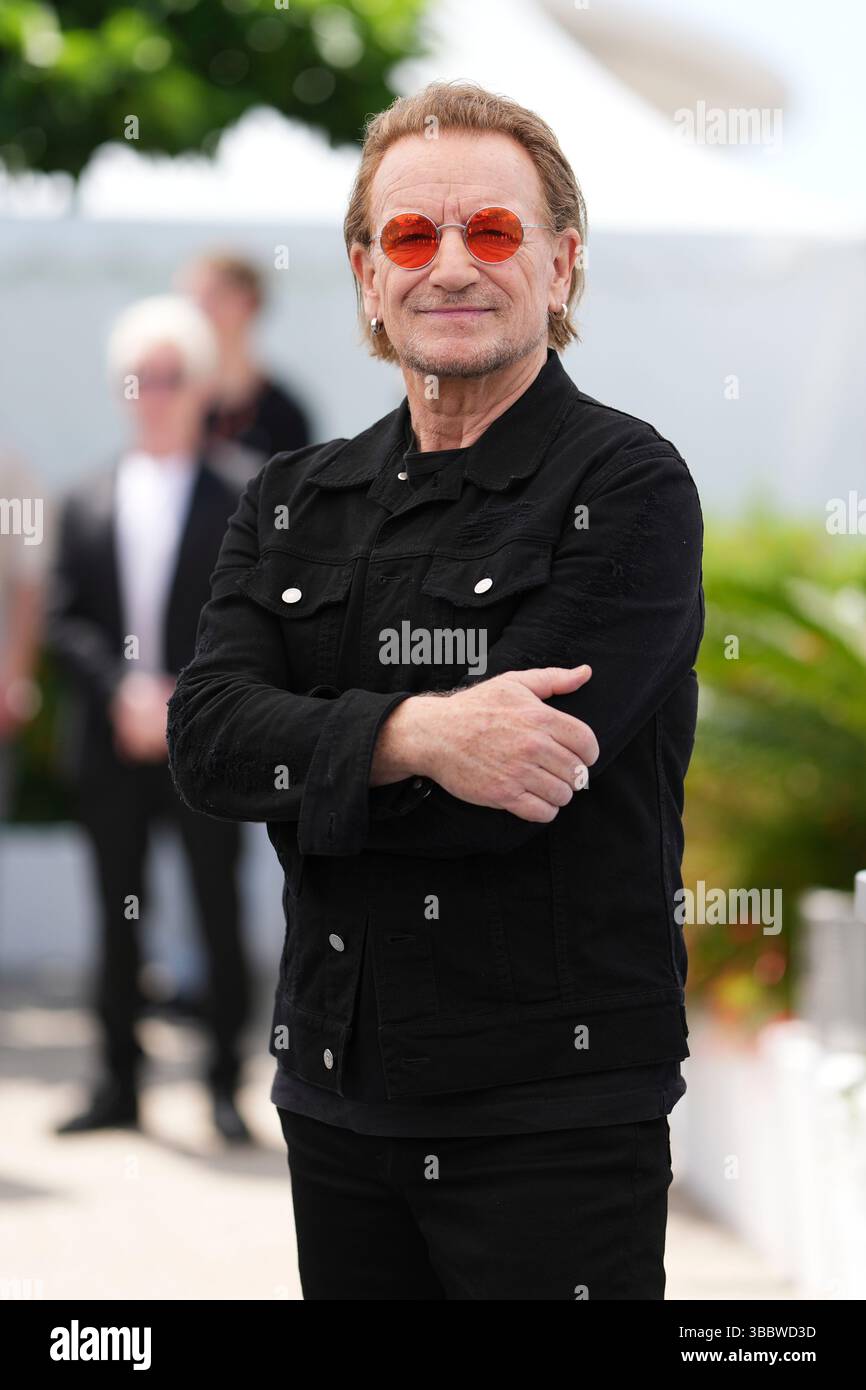 Bono poses for photographers at the photo call for the film 'Bono ...