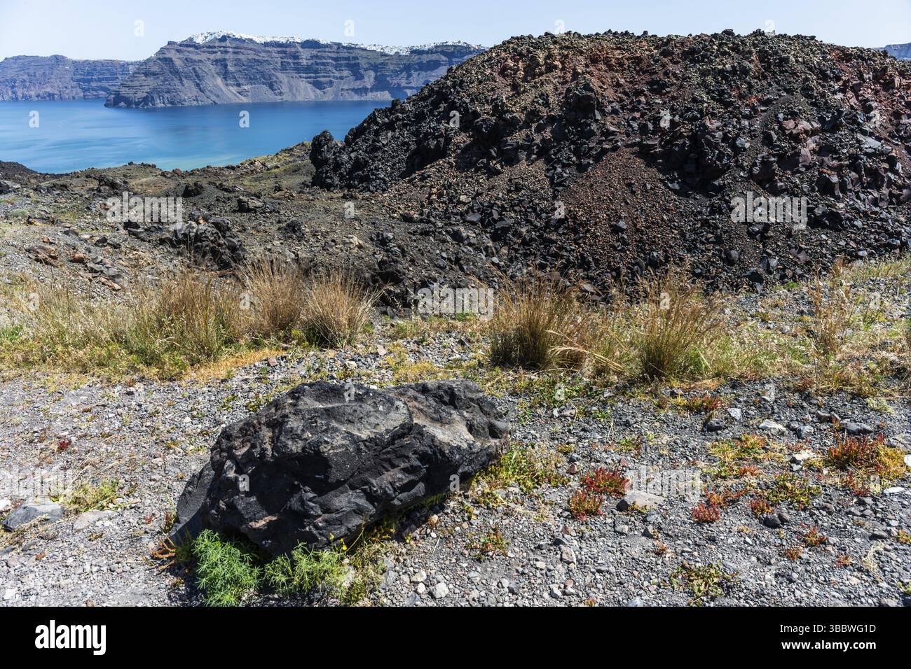 Lava scree, view of the caldera from the volcanic island of Nea Kameni ...