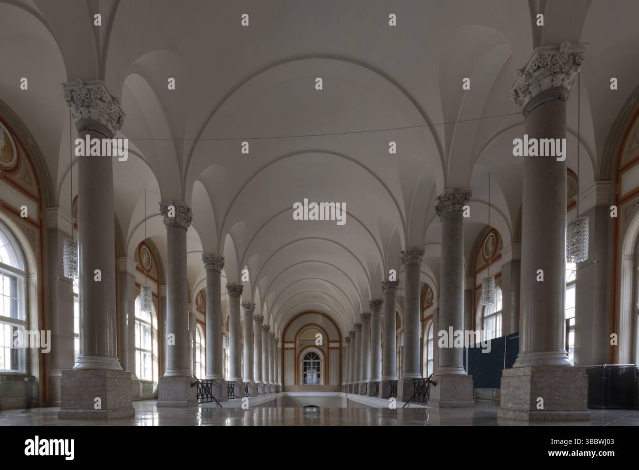 Long corridor with vaulted ceilings and columns, Munich, Bavaria ...