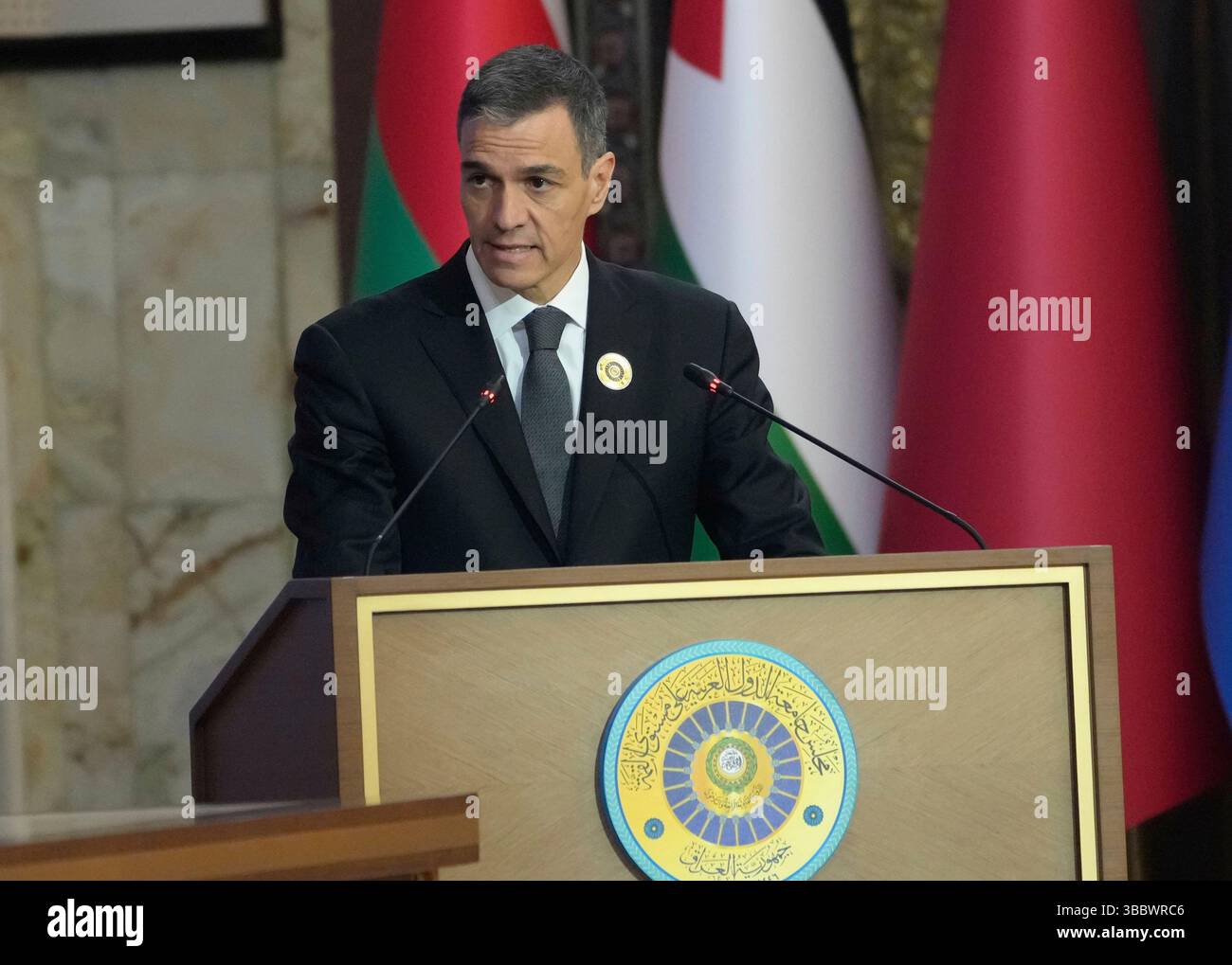 Spanish Prime Minister Pedro Sanchez gives his speech in the 34th Arab ...