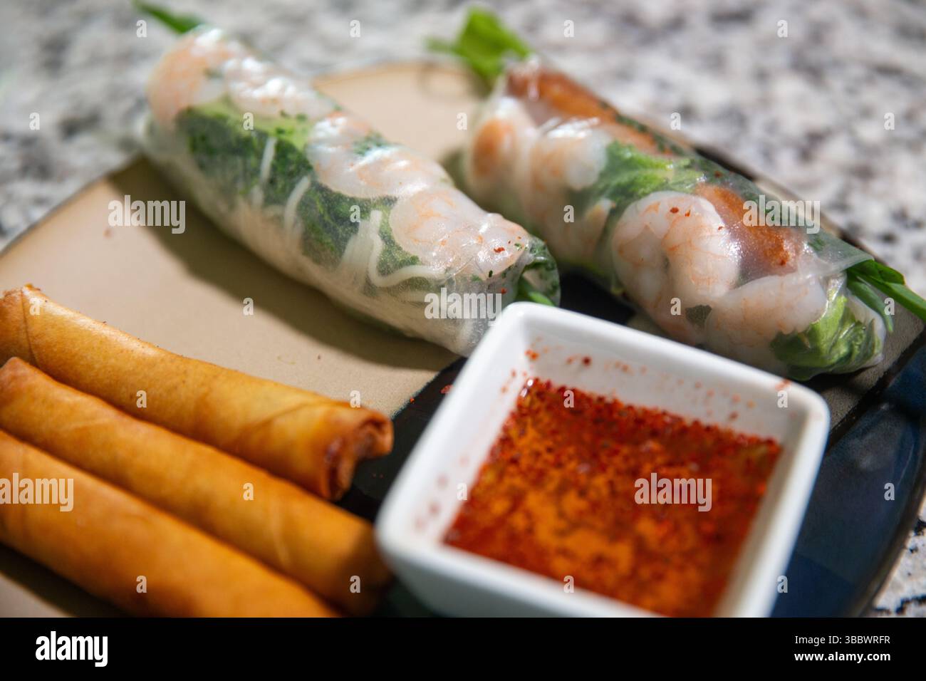 Vietnamese spring rolls with pork loempia and spicy fish sauce Stock ...