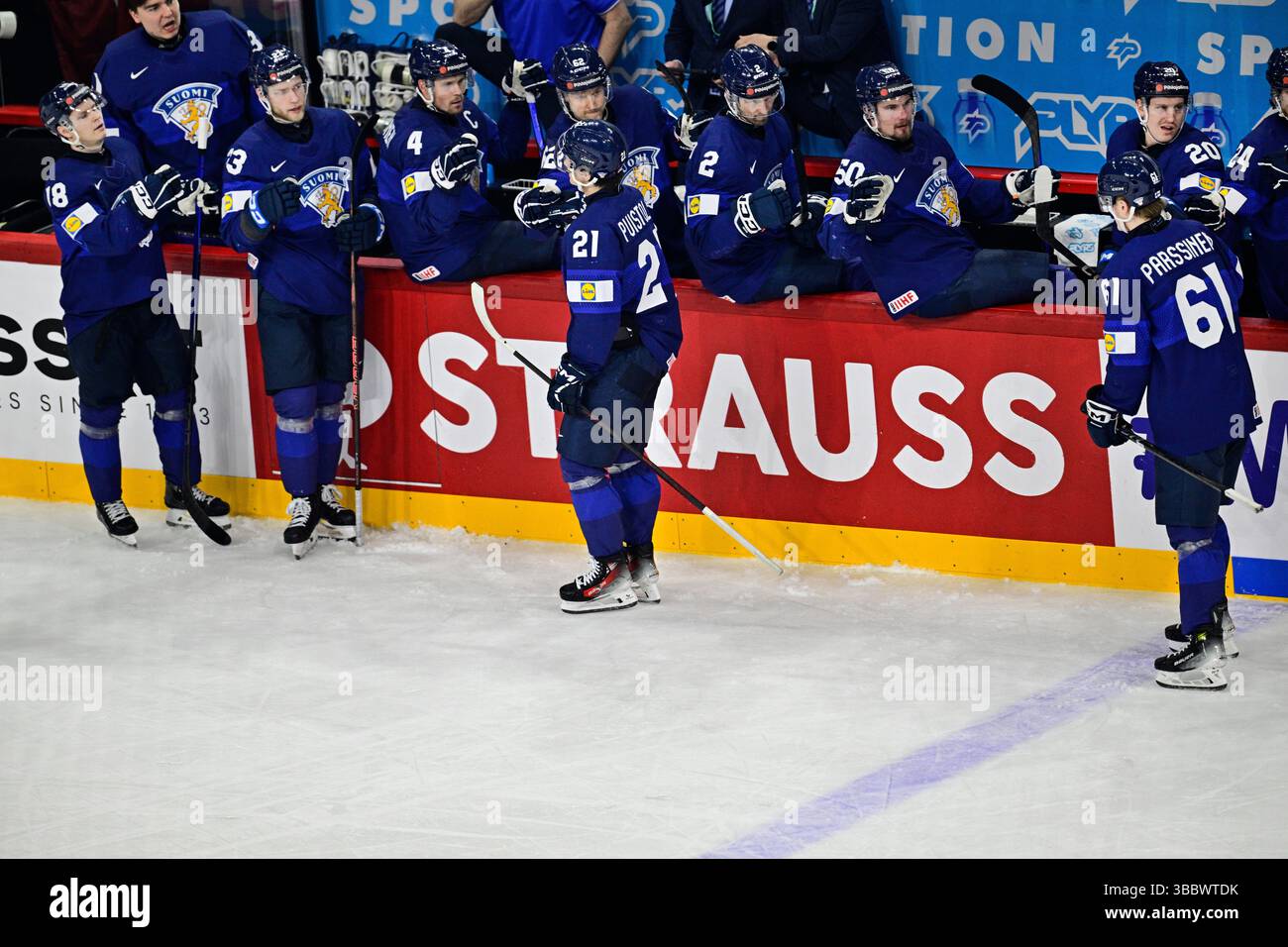 Finland's Juuso Parssinen, right, celebrates his goal with teammates ...