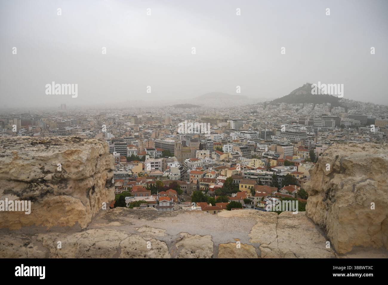 Athens, Greece, 16 May 2025. Athens is seen covered with dust clouds ...