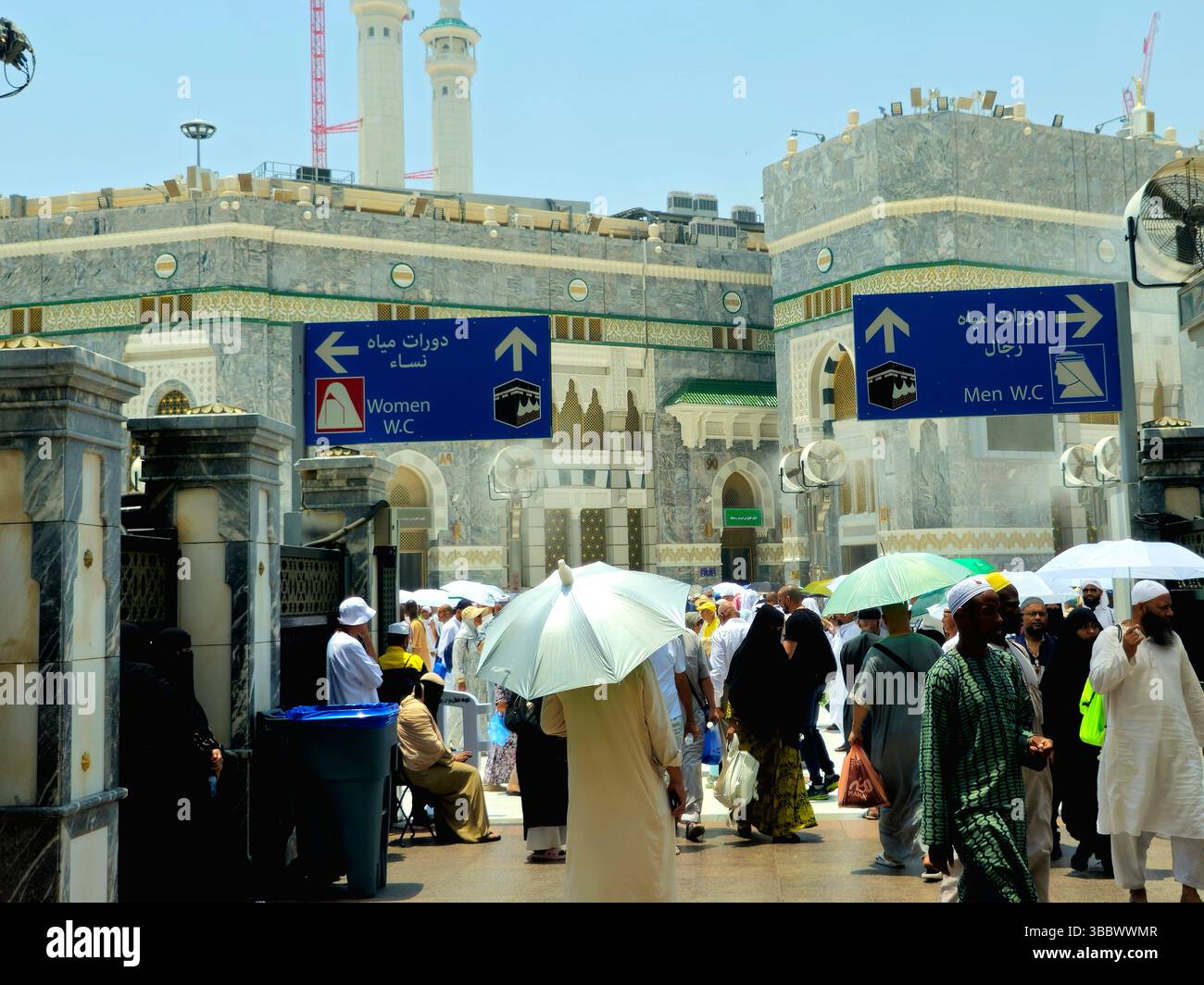 Mecca, Saudi Arabia, June 20 2024: signboards for Kaaba directions and ...