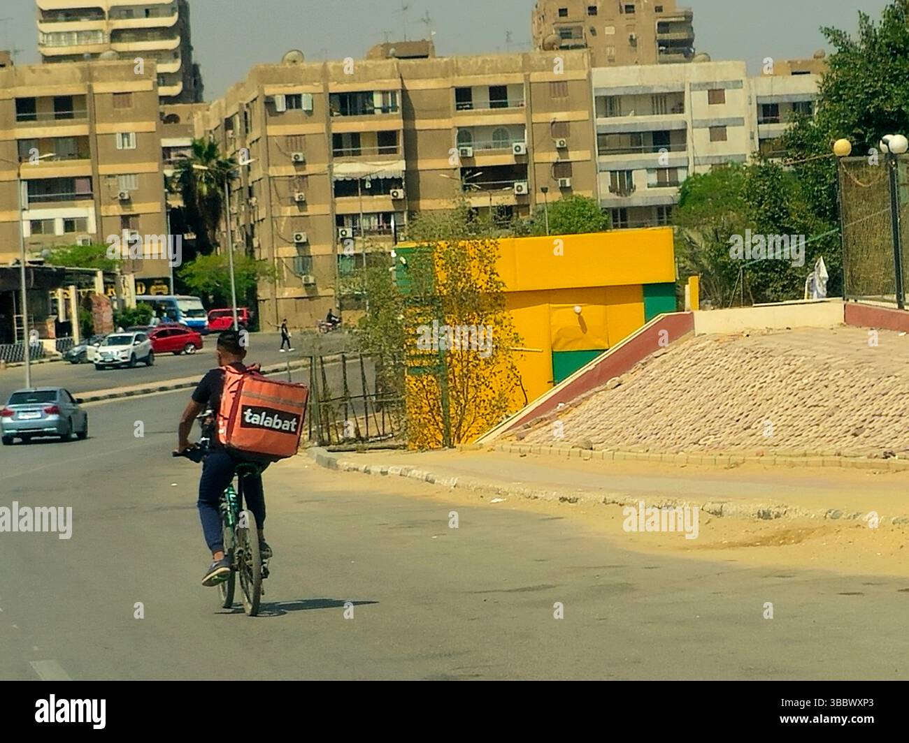 Cairo, Egypt, May 6 2025: Talabat bicycle (bike) delivery service of Food, groceries and more ...