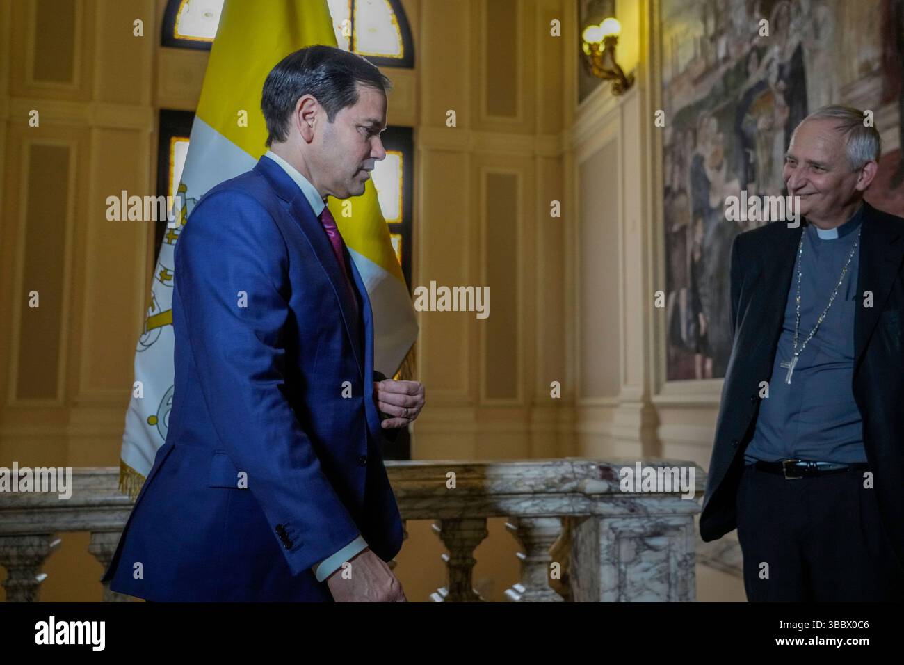 Secretary of State Marco Rubio, left, leaves after speaking to the ...