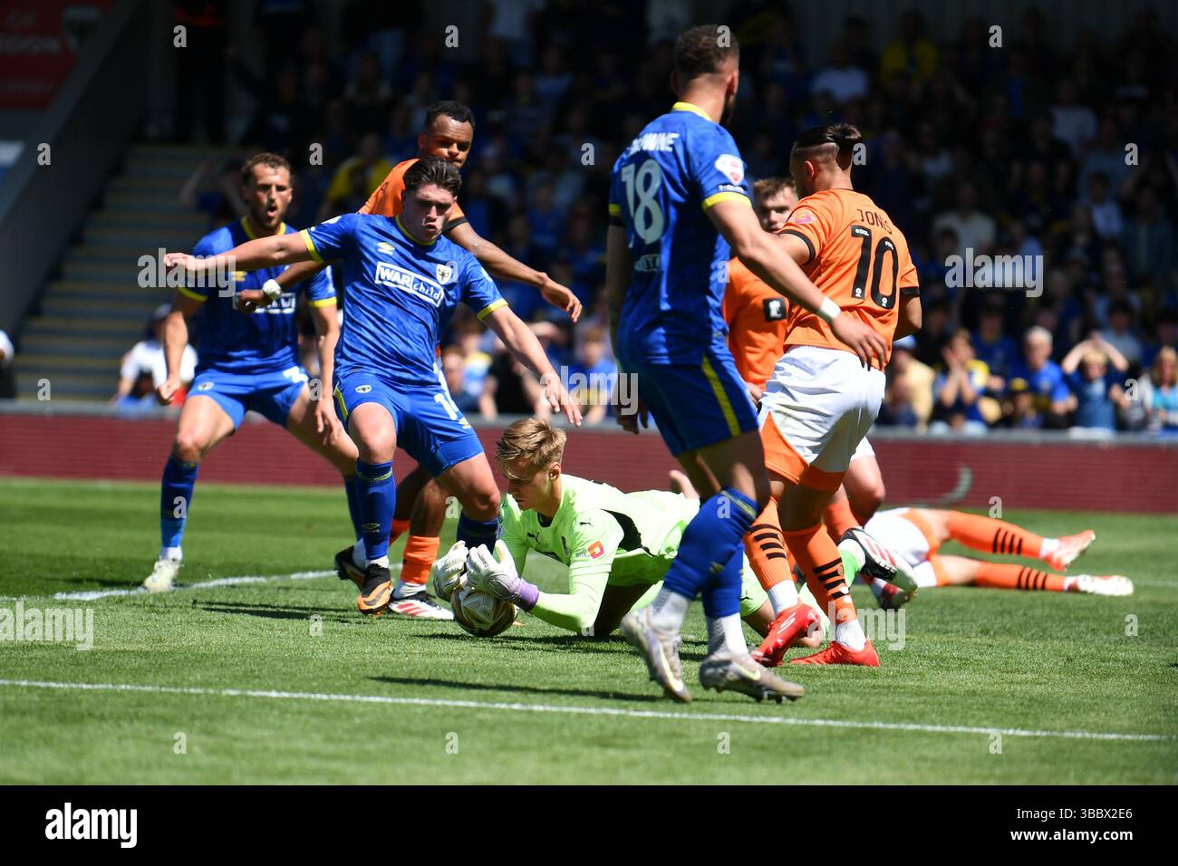 London, England. 17th May 2025. Matty Stevens is beaten to the ball by ...