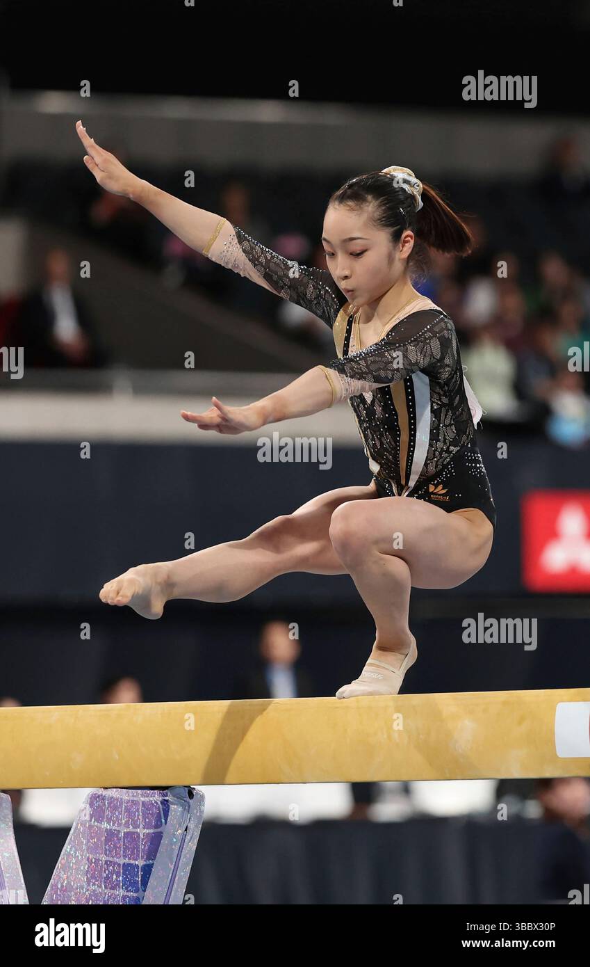 Mana OKAMURA performs her balance beam at the women's Artistic ...