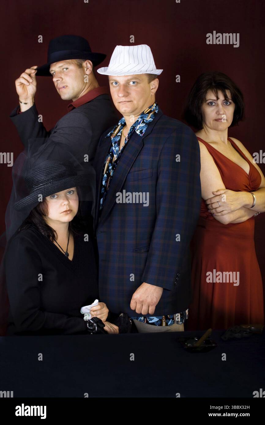 Crime scene of mafia extortion. Mobster with a gun Stock Photo - Alamy