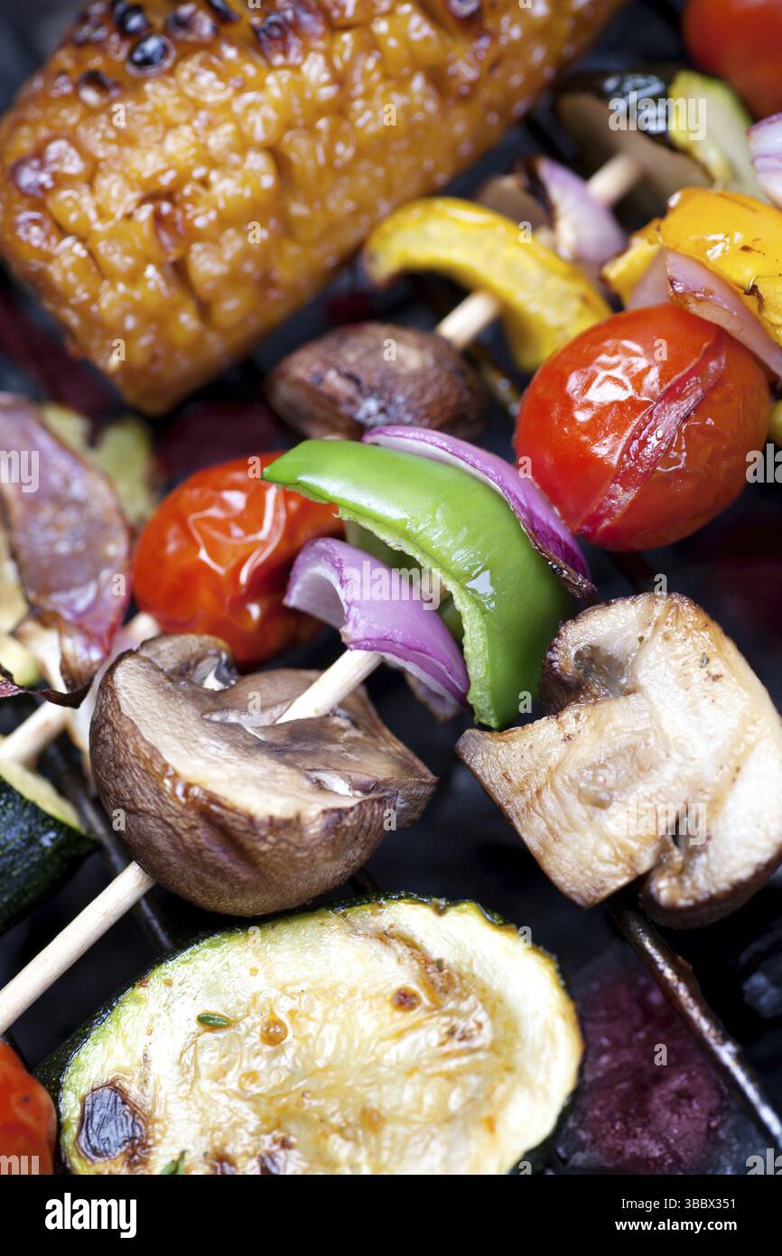 Different kinds of vegetable en brochette on the grill Stock Photo - Alamy