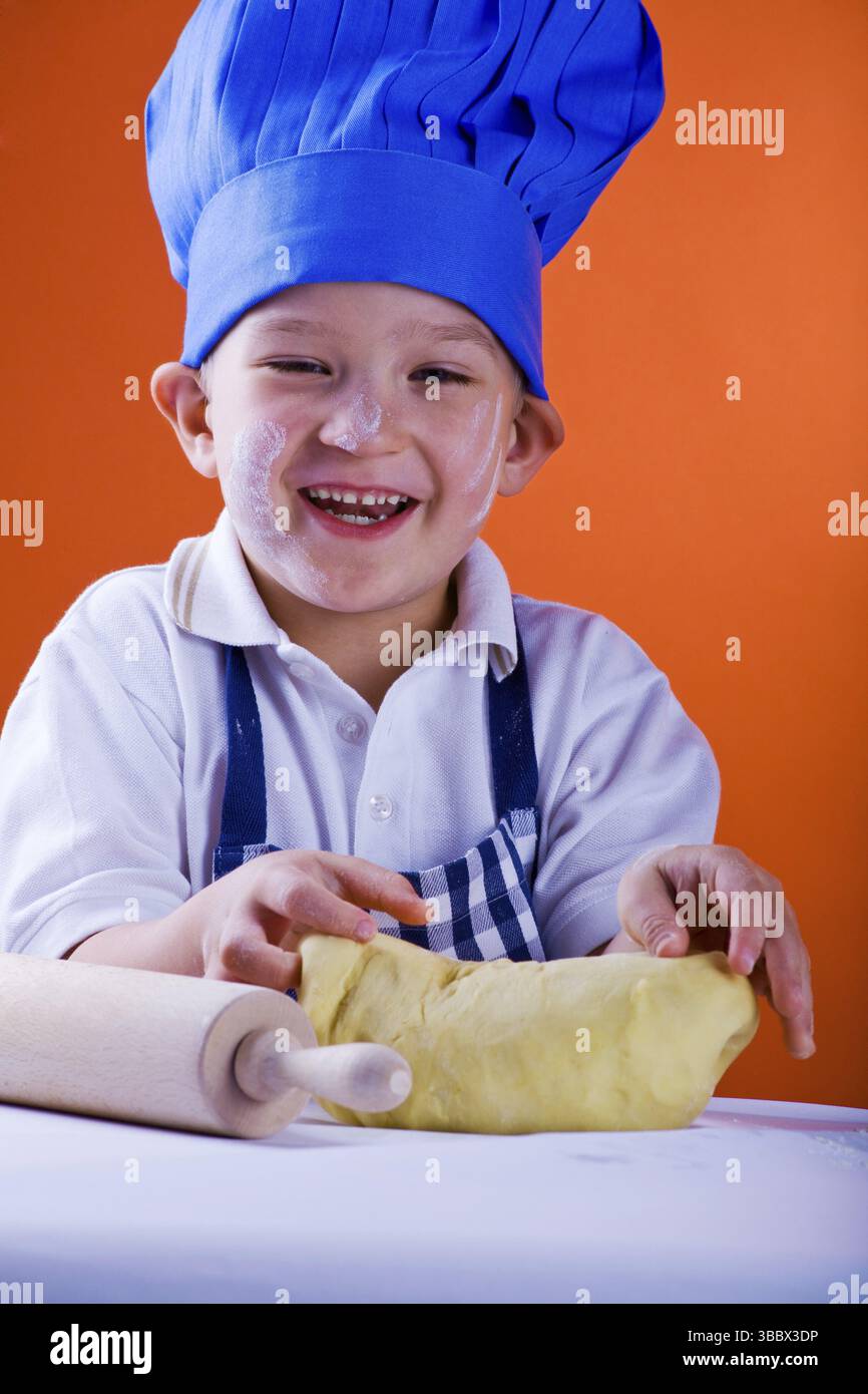 Kid baker hi-res stock photography and images - Alamy