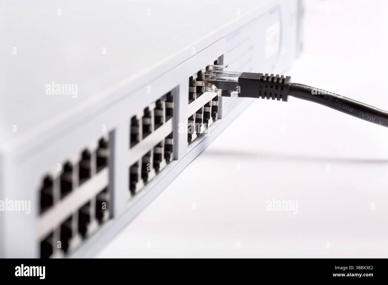 The network equipment. cables and the hub Stock Photo - Alamy