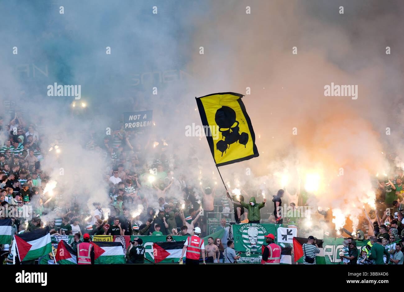 Celtic fans hold flares and flags, before the William Hill Premiership ...