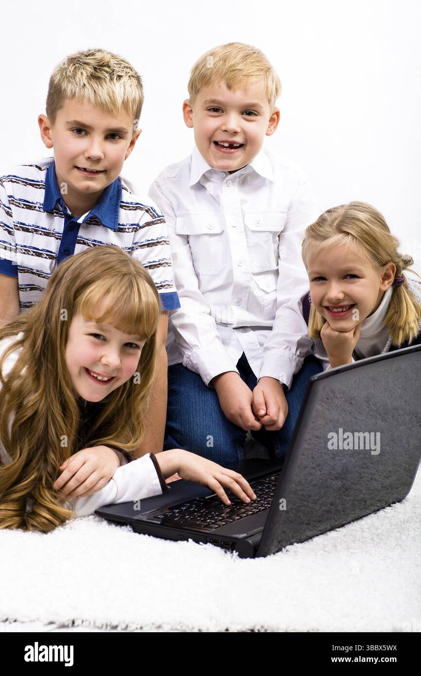 School children working on the laptop Stock Photo - Alamy