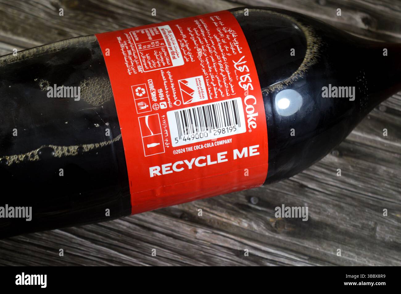 Cairo, Egypt, April 20 2025: Recycle me on a plastic bottle of Coca ...
