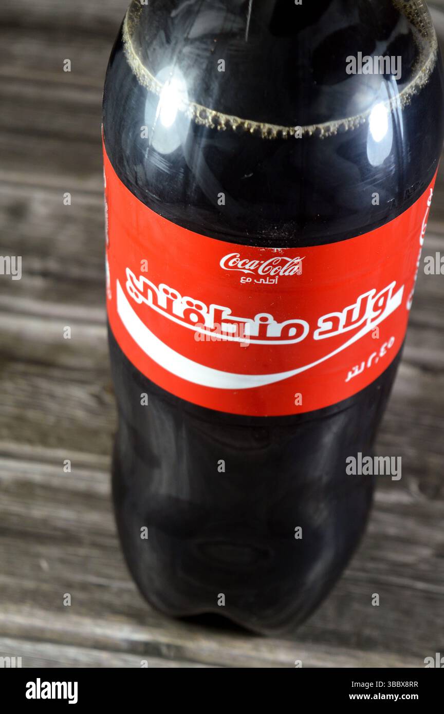 Cairo, Egypt, April 20 2025: Translation of Arabic on the bottle, (Coca ...