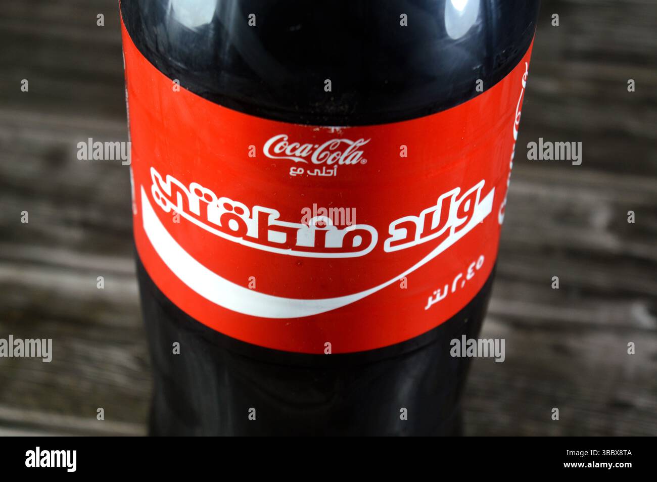 Cairo, Egypt, April 20 2025: Translation of Arabic on the bottle, (Coca ...