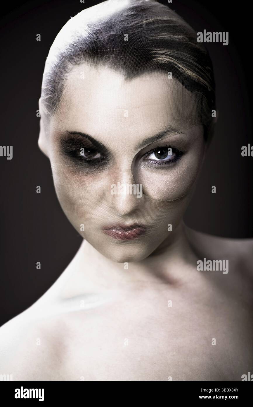 Portrait of young a woman with a nylon stocking over head Stock Photo ...