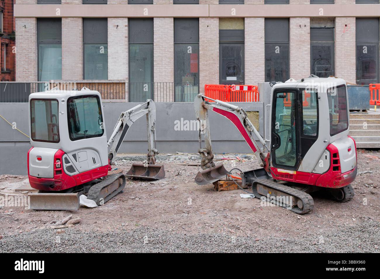 Construction site digger during excavation on building site in city ...