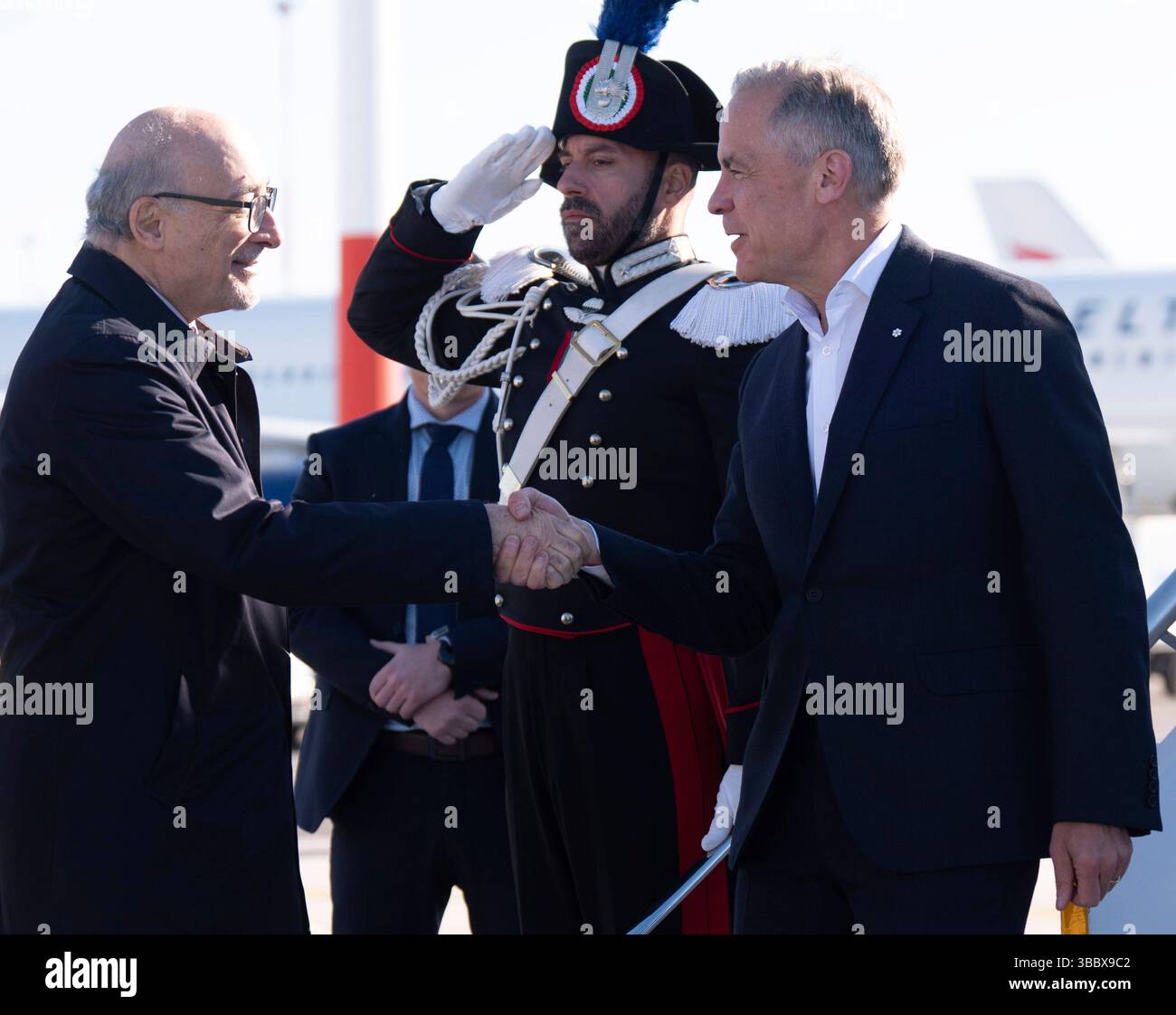 Prime Minister Mark Carney is greeted by Cristiano Gallo, Italy‚Äôs ...