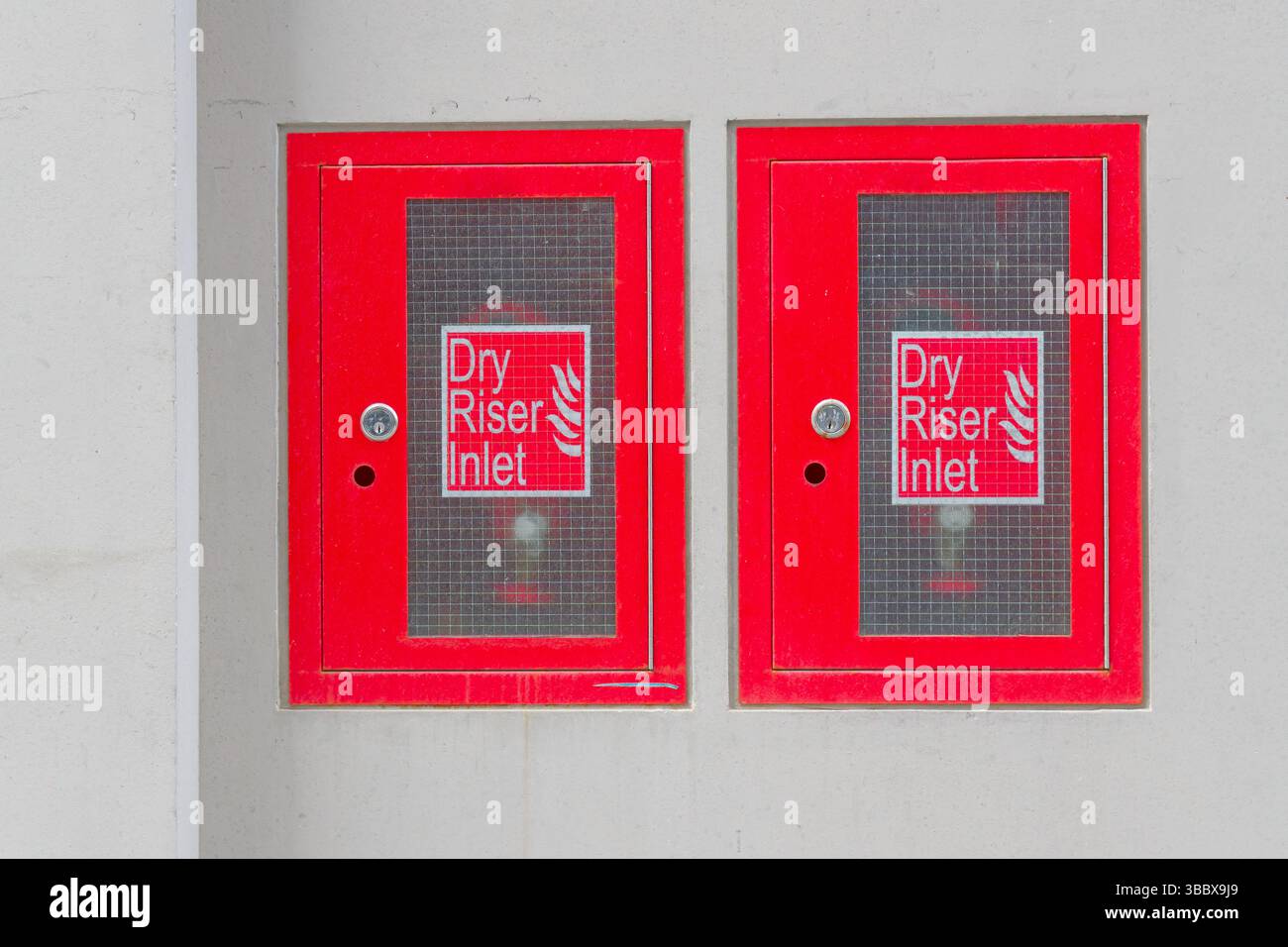 Dry riser inlet cabinet located on building Stock Photo - Alamy