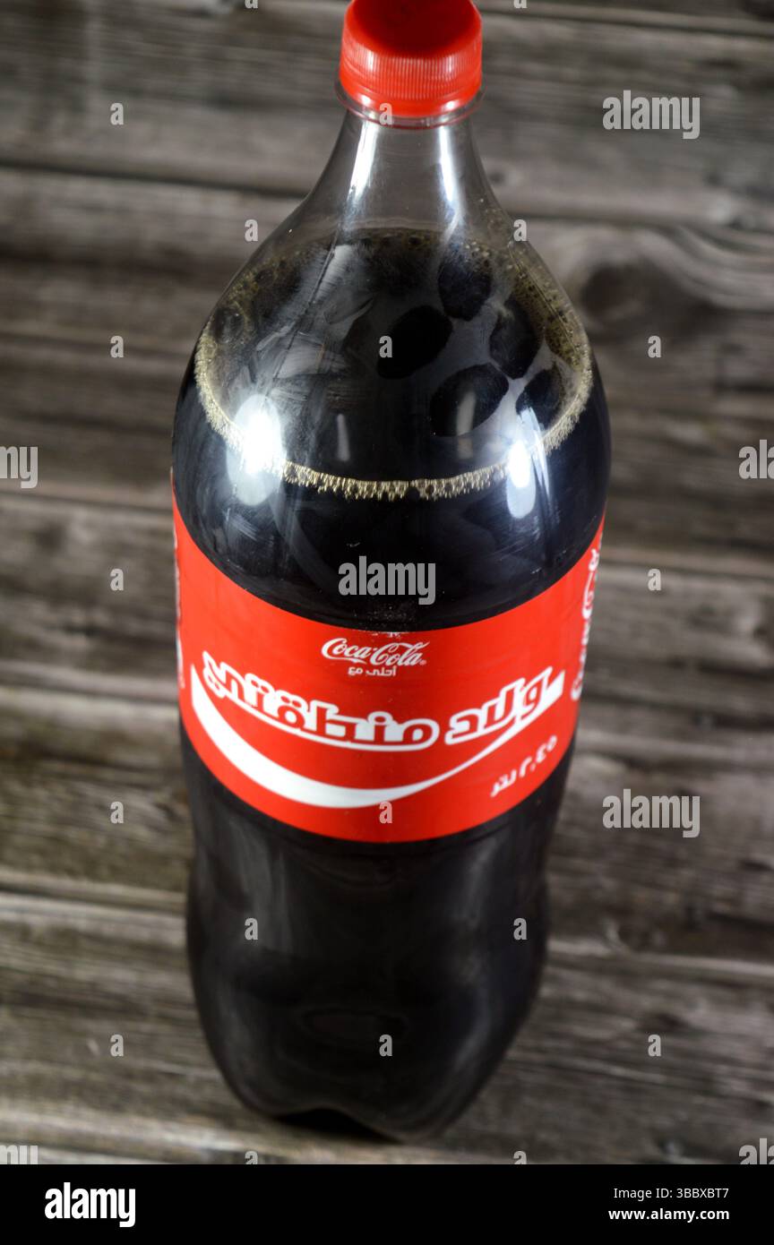 Cairo, Egypt, April 20 2025: Translation of Arabic on the bottle, (Coca ...