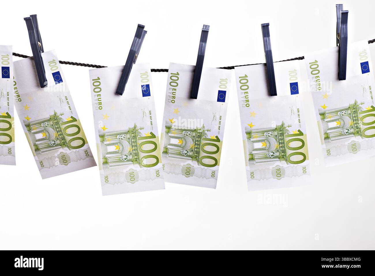 Symbolic picture with euros for money washing Stock Photo - Alamy