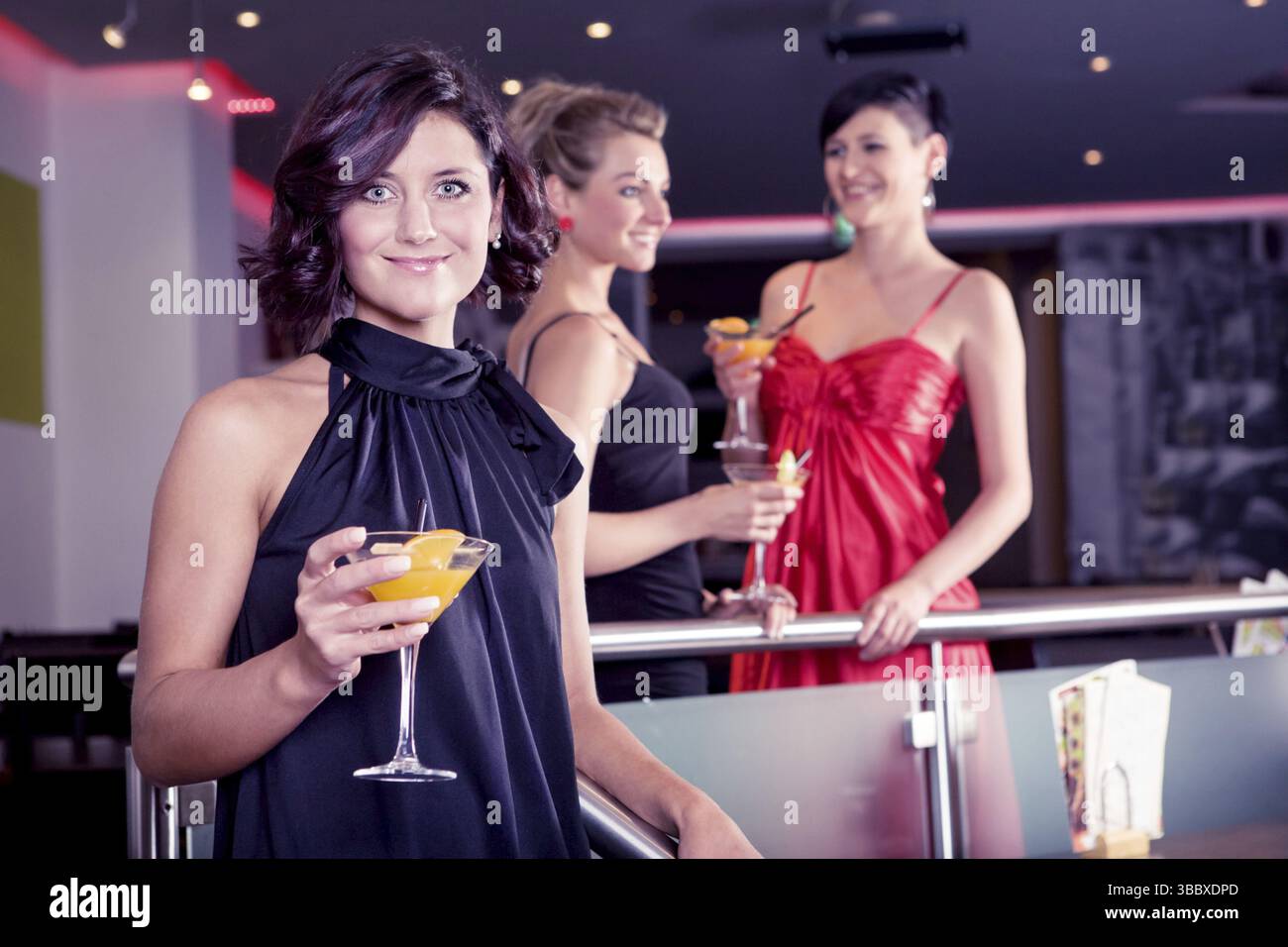 Group of young women in the bar Stock Photo - Alamy