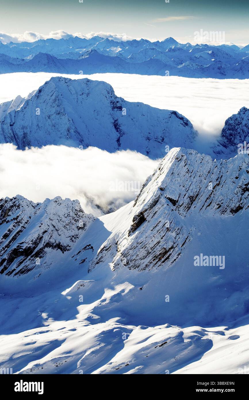 Alps in the winter time. Ski area about Zugspitze peak in Germany and ...