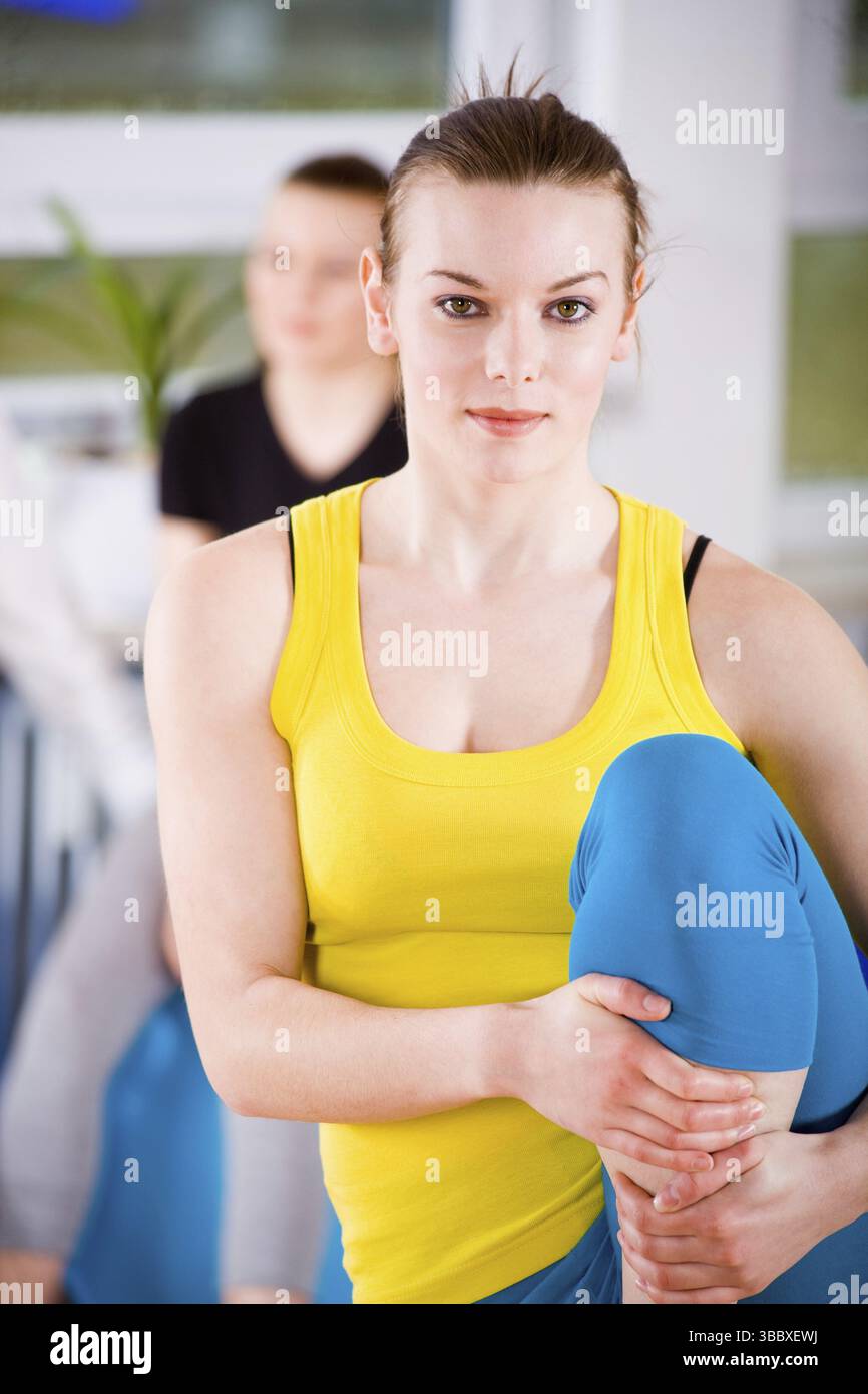Young women exercising in a step aerobics class Stock Photo - Alamy