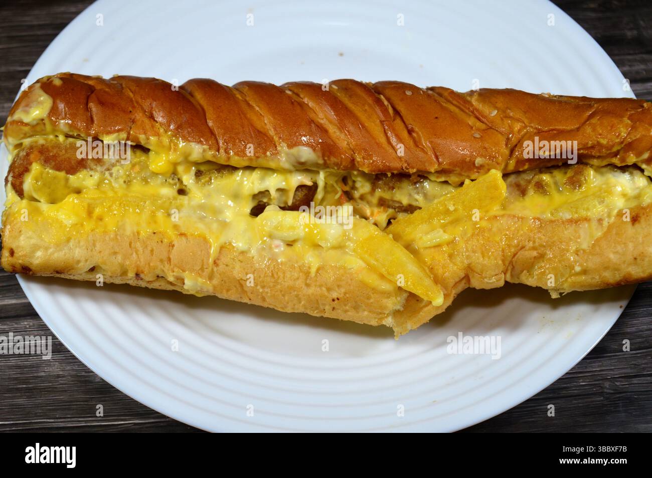Chicken roll sandwich, two rolled chicken pieces stuffed with ...