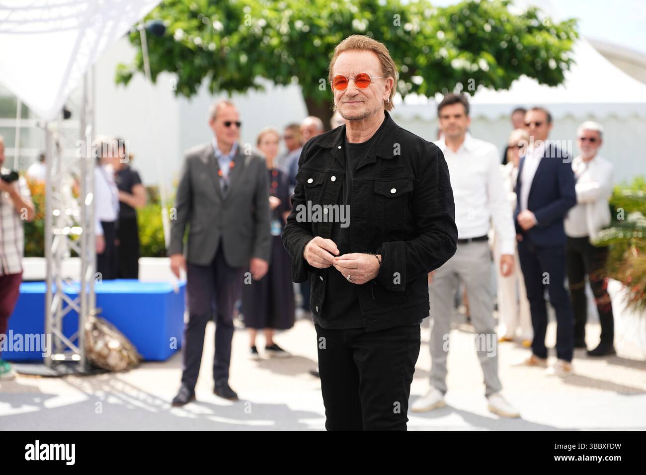 Bono poses for photographers at the photo call for the film 'Bono' at ...