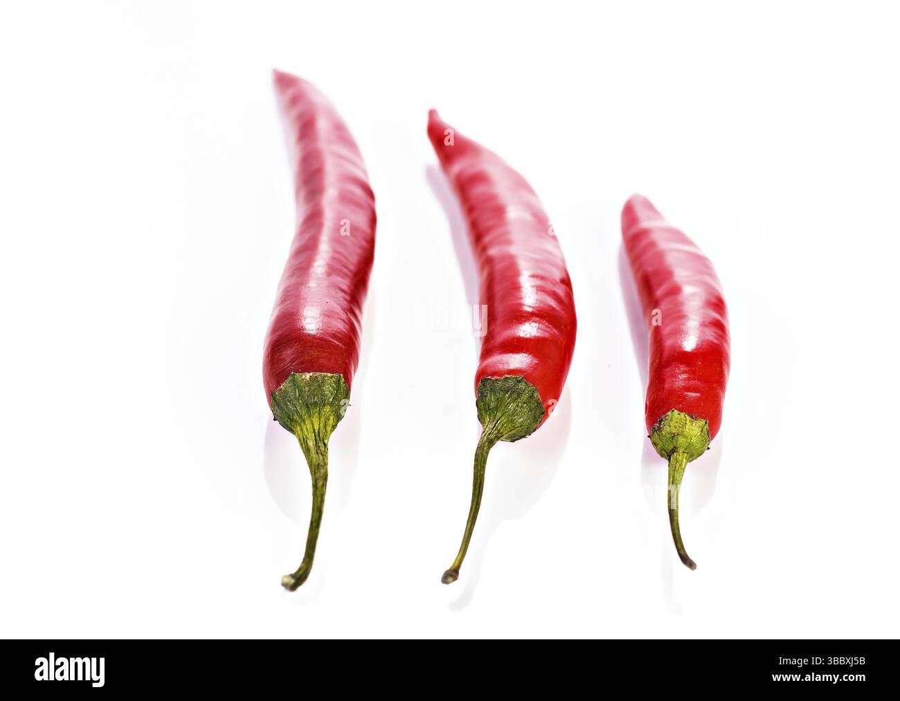 A still life shoot of red pepper on the table Stock Photo - Alamy