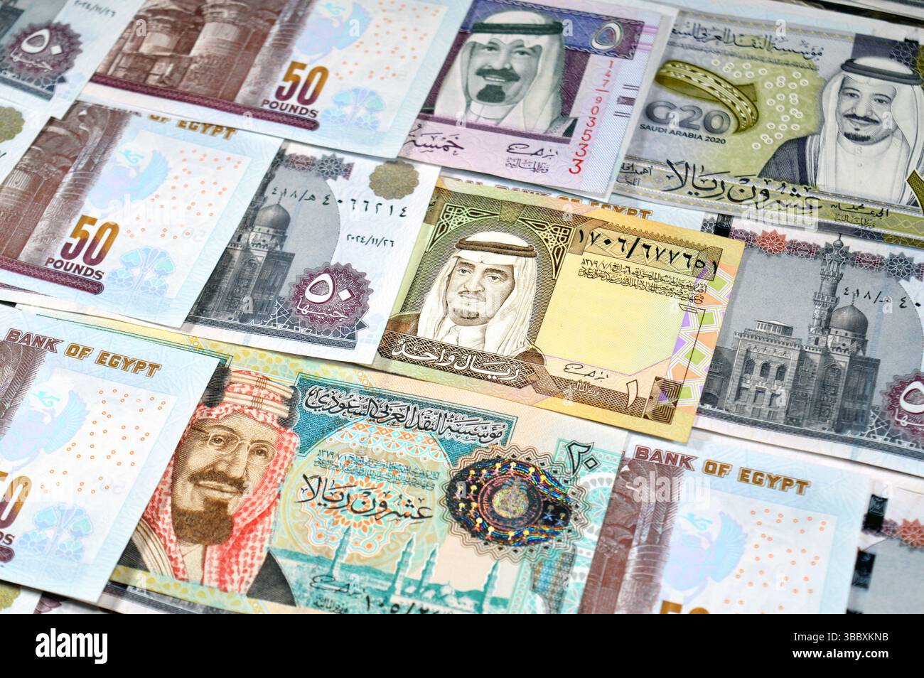 Saudi Arabia riyals SAR cash money bills banknotes and Pile of Egypt ...