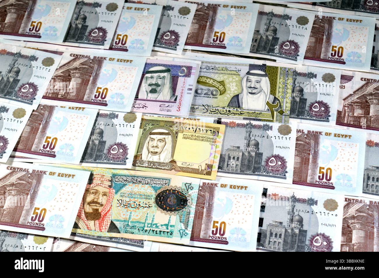 Saudi Arabia riyals SAR cash money bills banknotes and Pile of Egypt ...