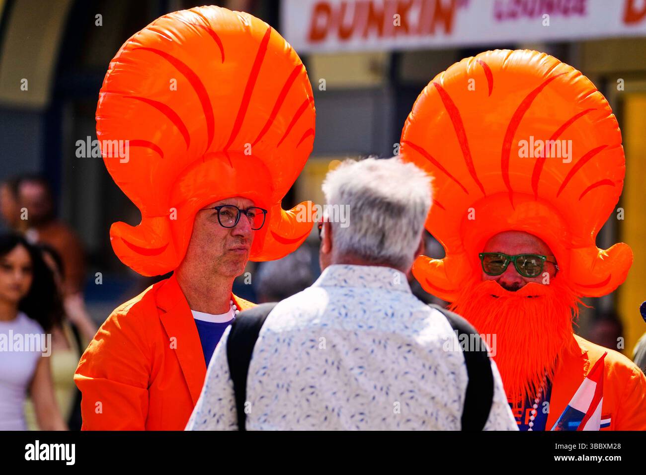 Dutch Eurovision fans talk in the city center ahead of the Grand Final ...