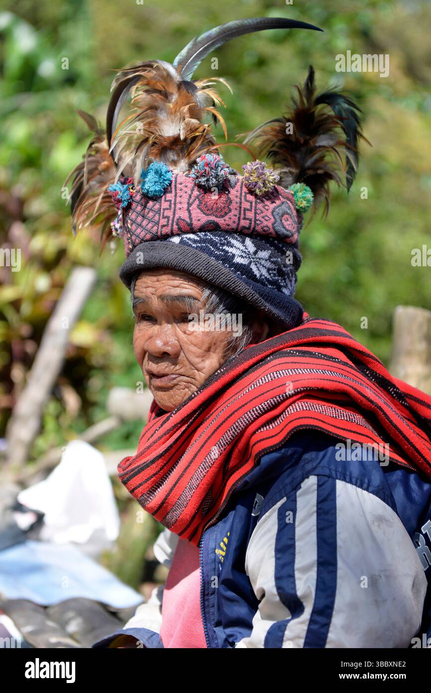 Old Ifugao woman in traditional clothing and headdress in Banaue ...