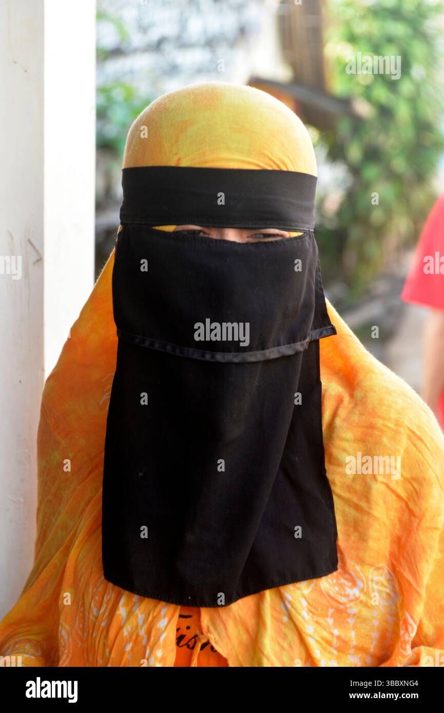 Portrait of a muslim woman wearing a veil in Coron island, Philippines ...