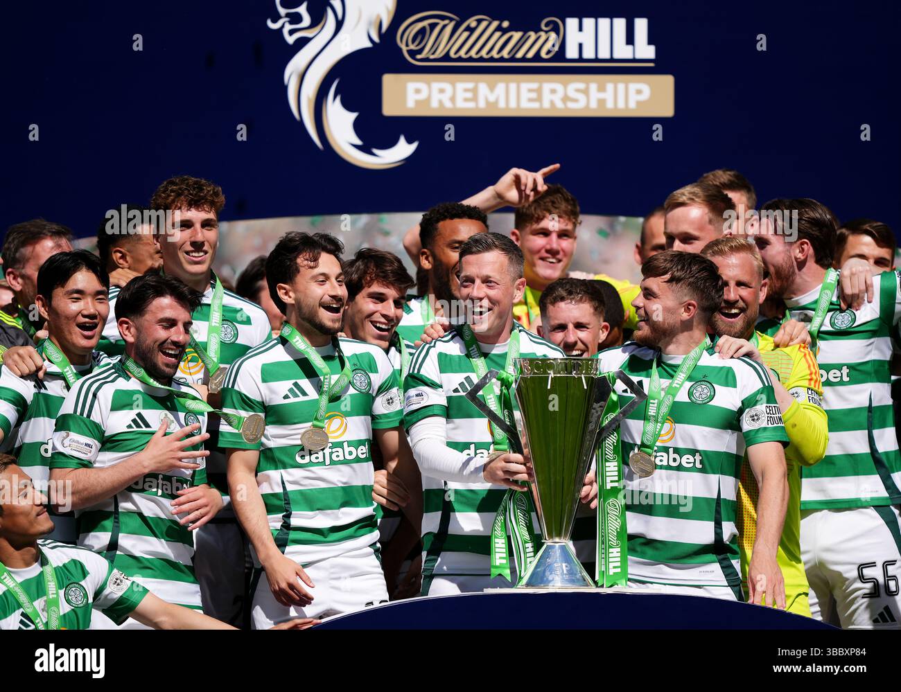 Celtic captain Callum McGregor lifts the Scottish Premiership trophy ...