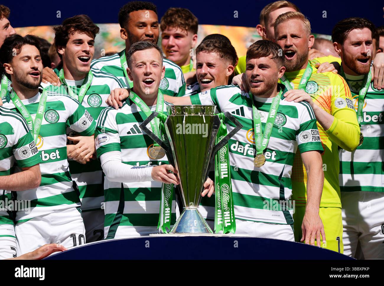 Celtic captain Callum McGregor lifts the Scottish Premiership trophy ...