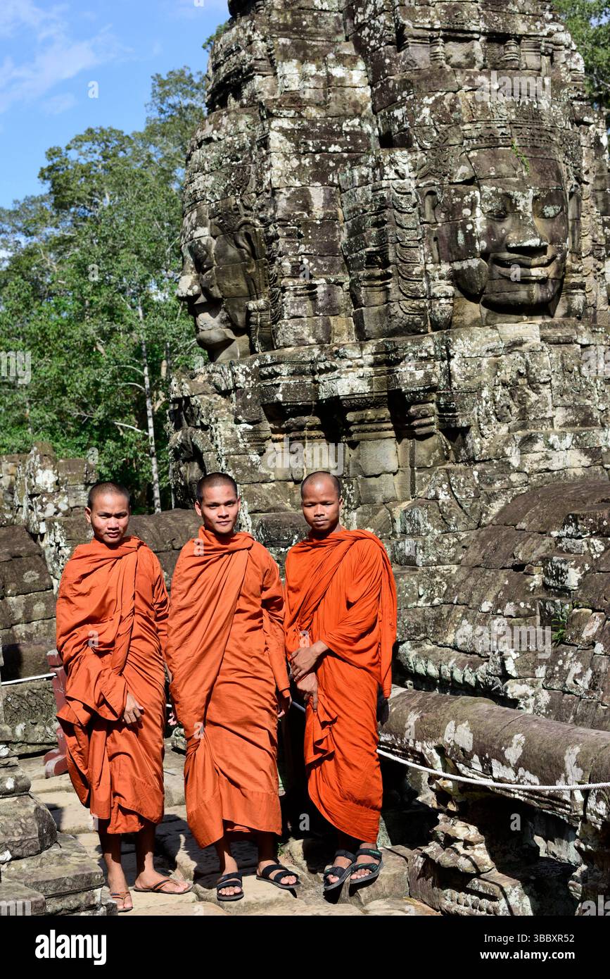 Buddhist monks in the inner part of Bayon temple,Angkor Thom, Cambodia ...
