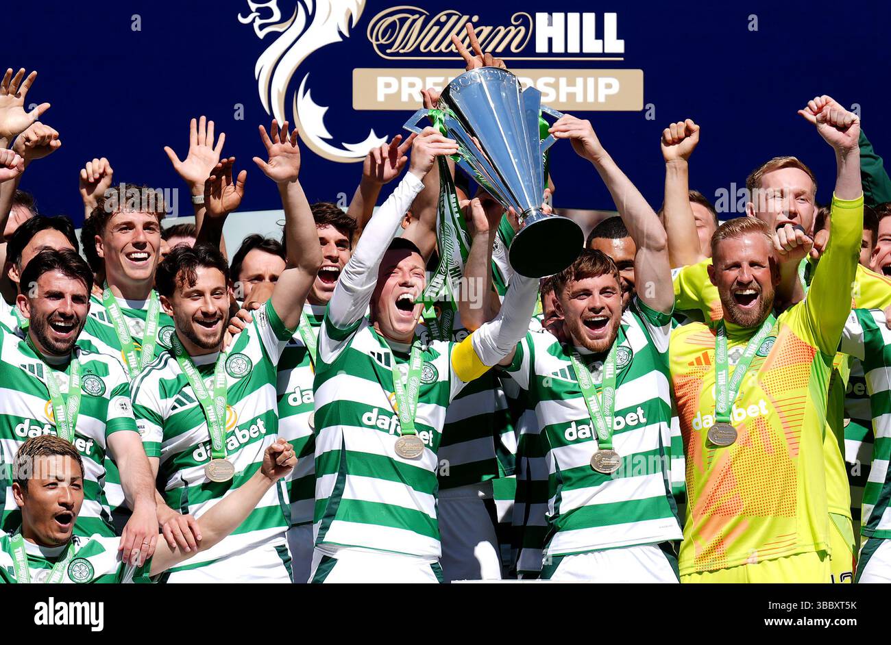 Celtic captain Callum McGregor lifts the Scottish Premiership trophy ...