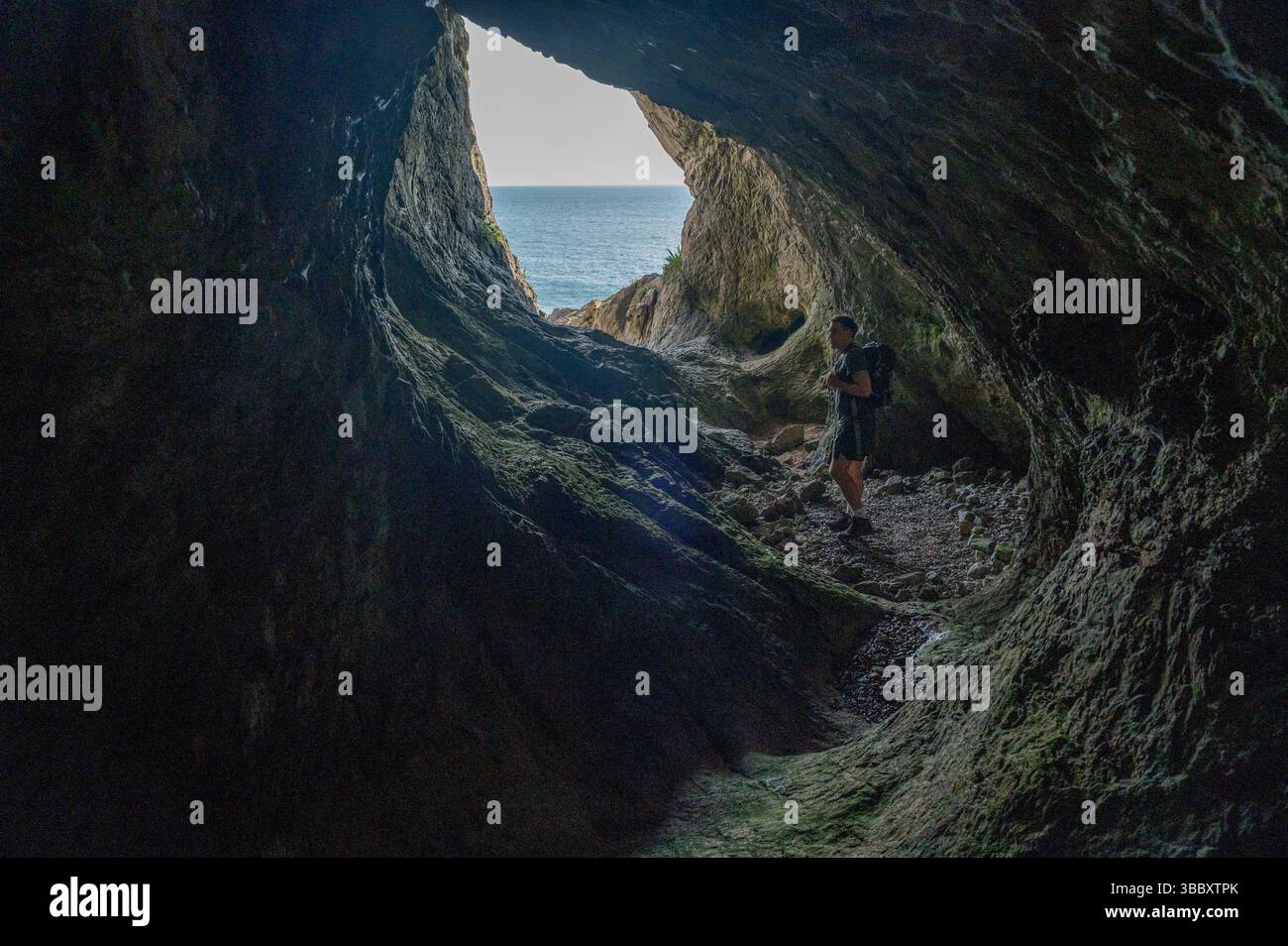 Looking out of Paviland or Goats Hole Cave, South Gower cliffs, Wales ...