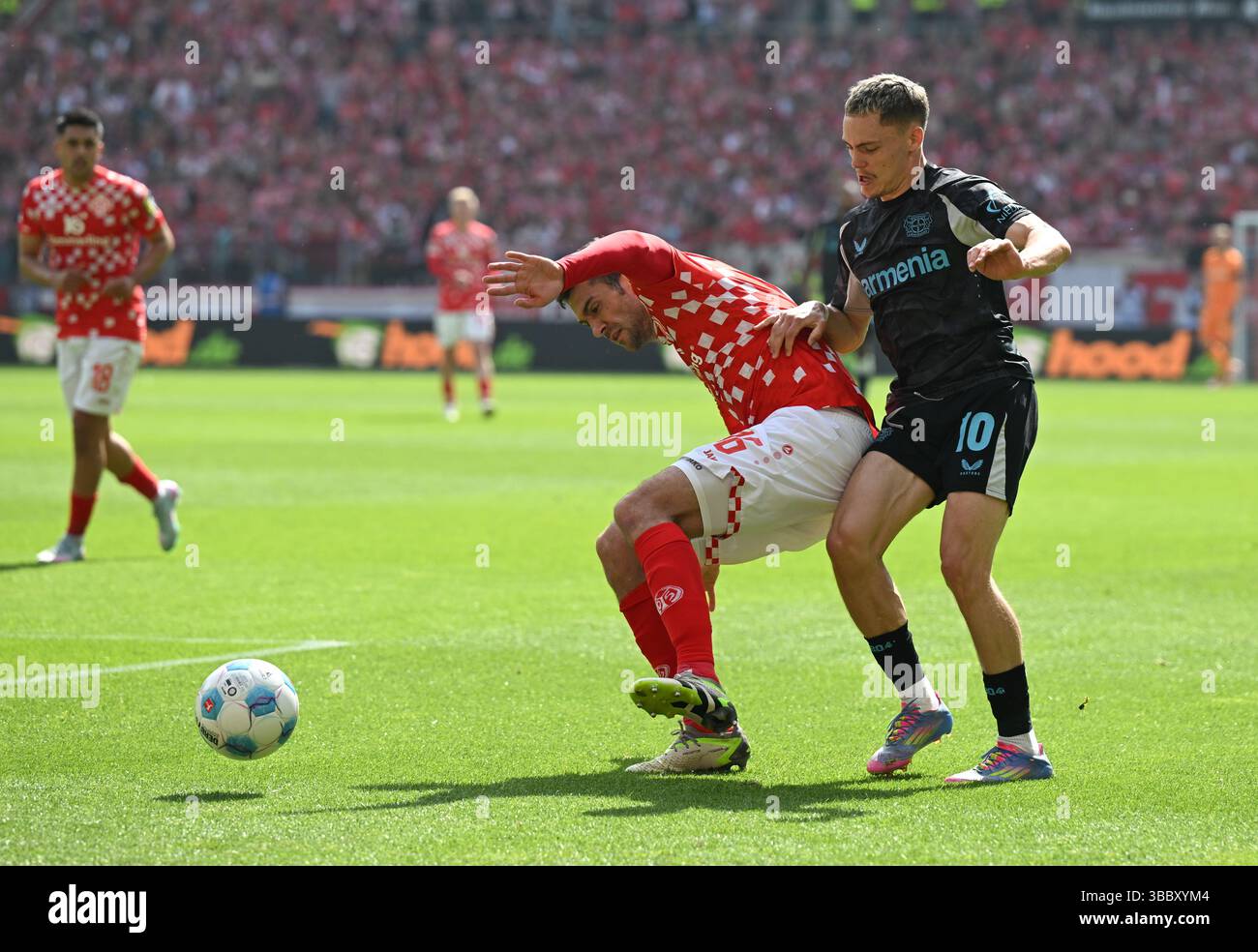 Mainz, Germany. 17th May, 2025. Soccer: Bundesliga, 1. FSV Mainz 05 - Bayer Leverkusen, Matchday ...