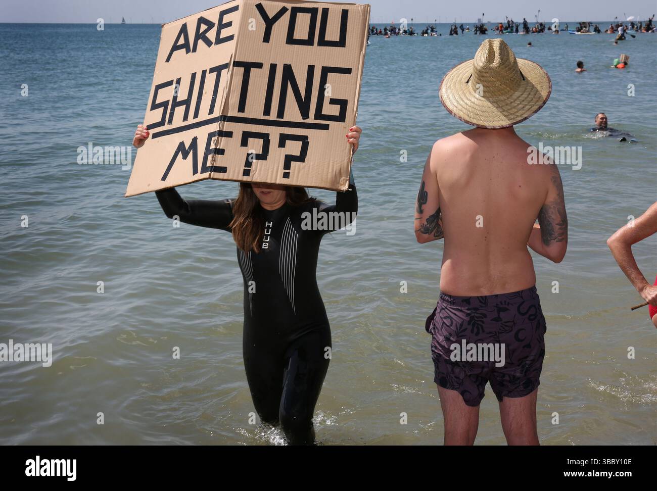 Brighton, England, UK. 17th May, 2025. A protester with a sign saying ...